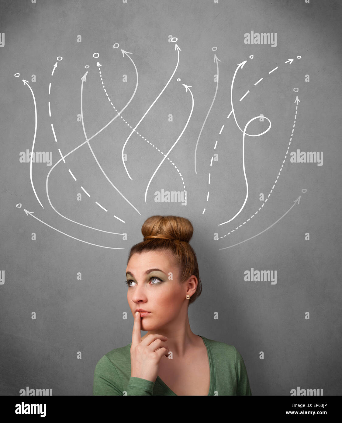Young woman with arrows coming out of her head Stock Photo - Alamy