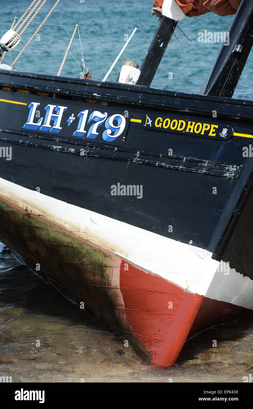 The restored 'Fifie' fishing boat Good Hope beached on the beach at ...