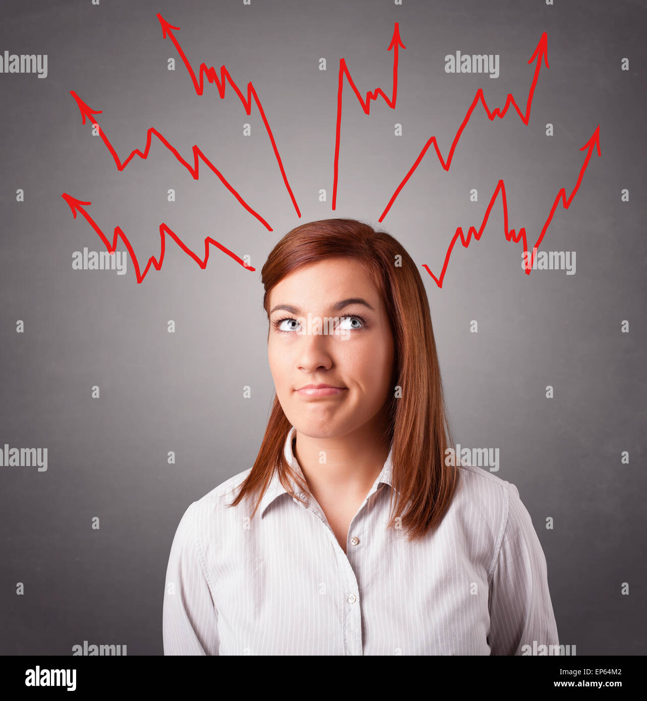 Young woman thinking with arrows overhead Stock Photo - Alamy