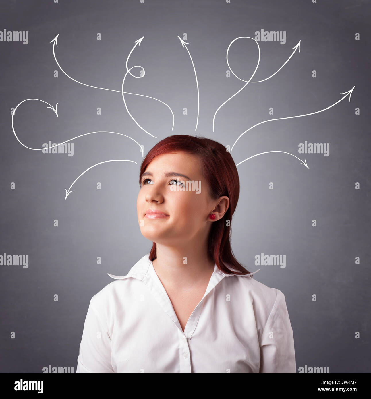 Young girl thinking with arrows overhead Stock Photo - Alamy