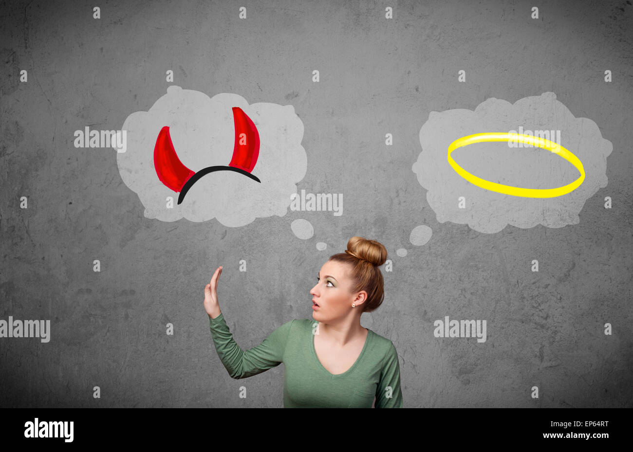Woman choosing between good and bad Stock Photo - Alamy