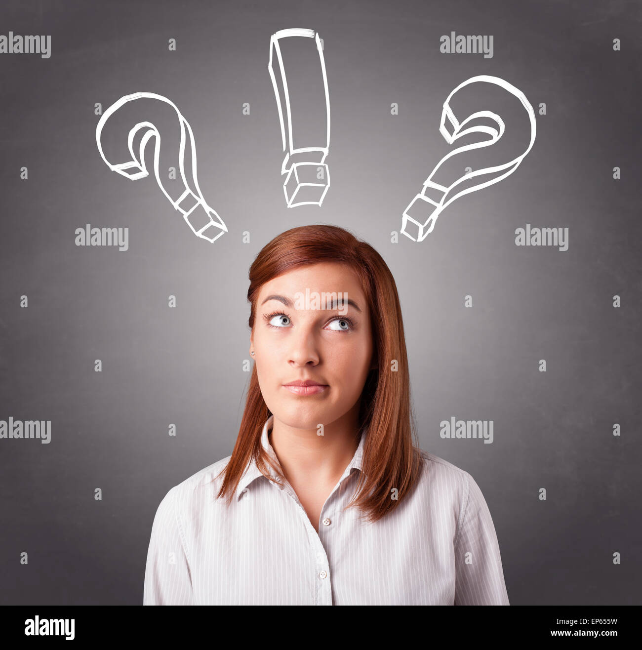 Young lady thinking with question marks overhead Stock Photo - Alamy