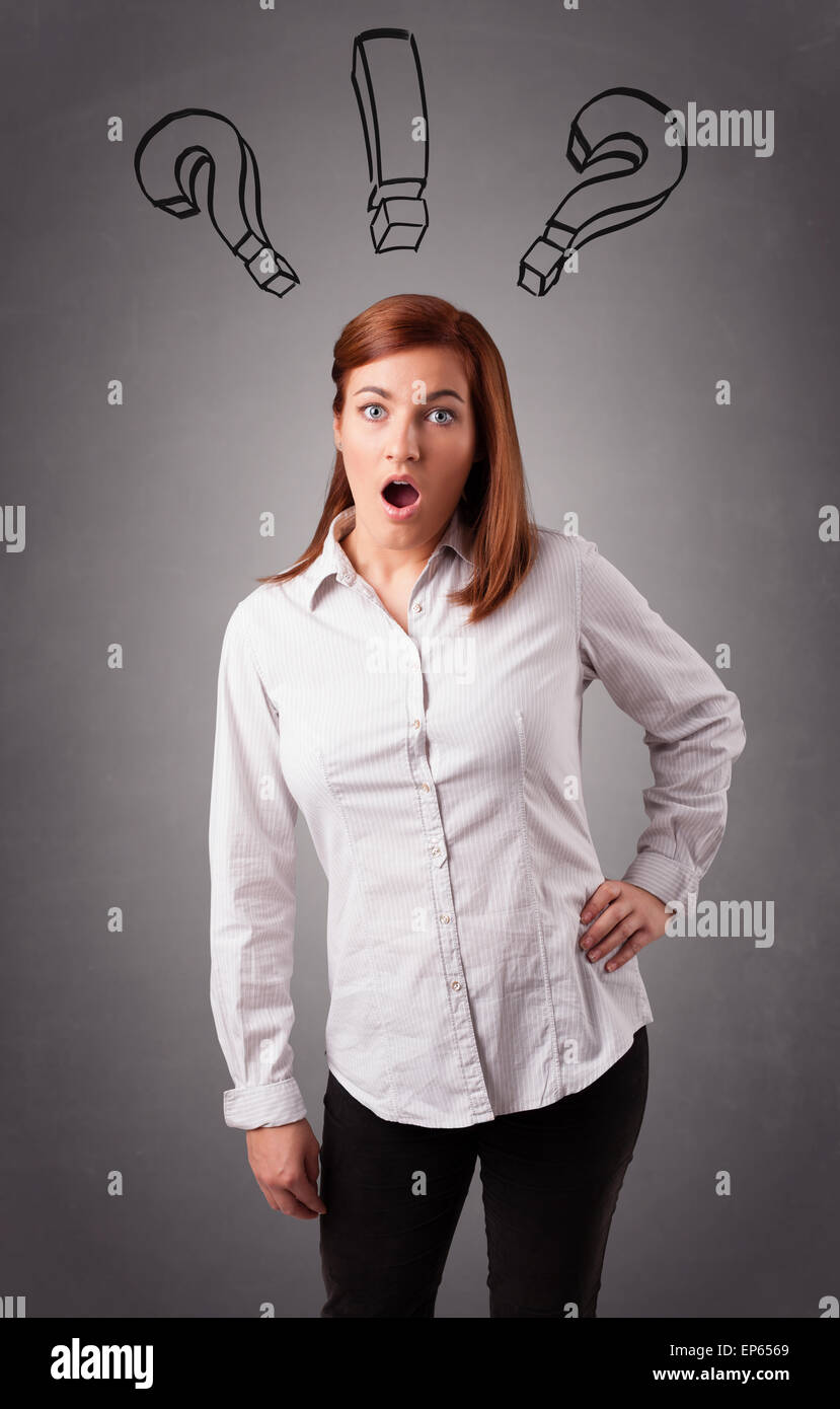 Young lady thinking with question marks overhead Stock Photo - Alamy