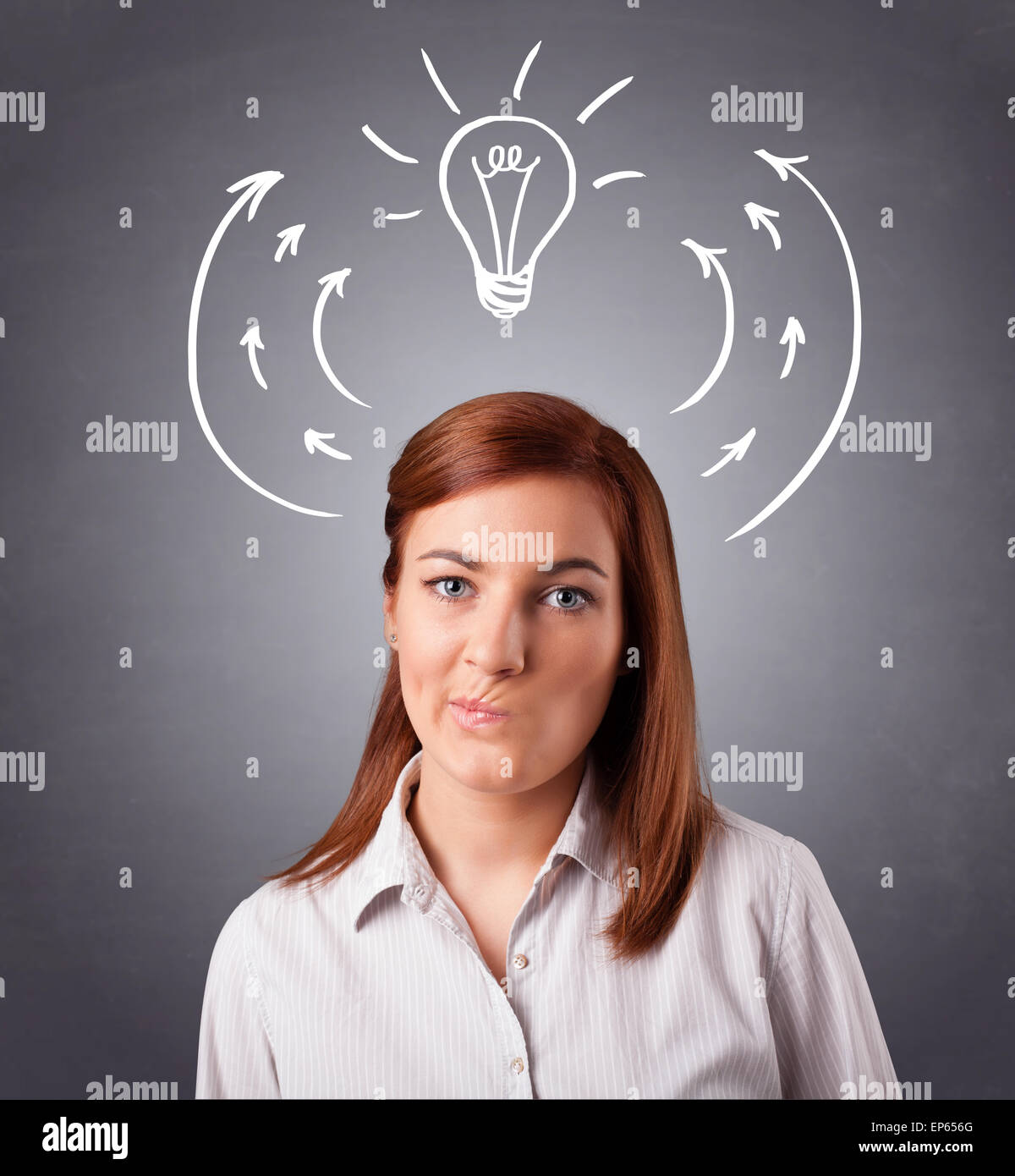 Pretty lady thinking with arrows and light bulb overhead Stock Photo ...