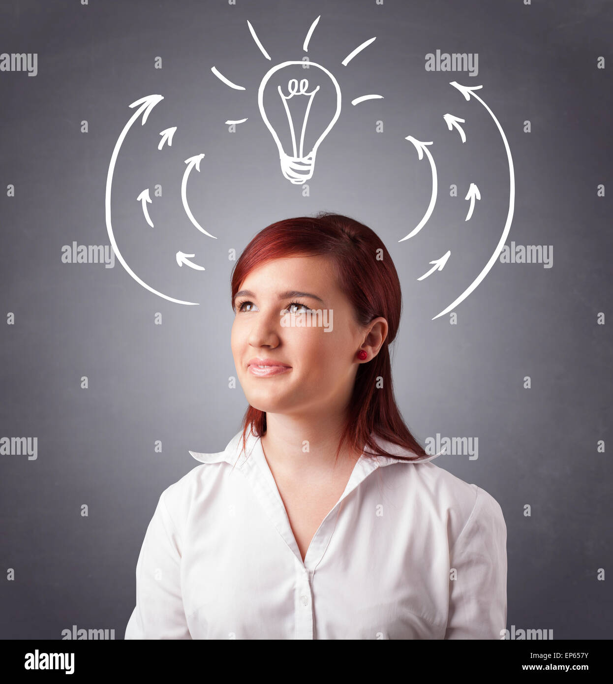 Pretty lady thinking with arrows and light bulb overhead Stock Photo ...