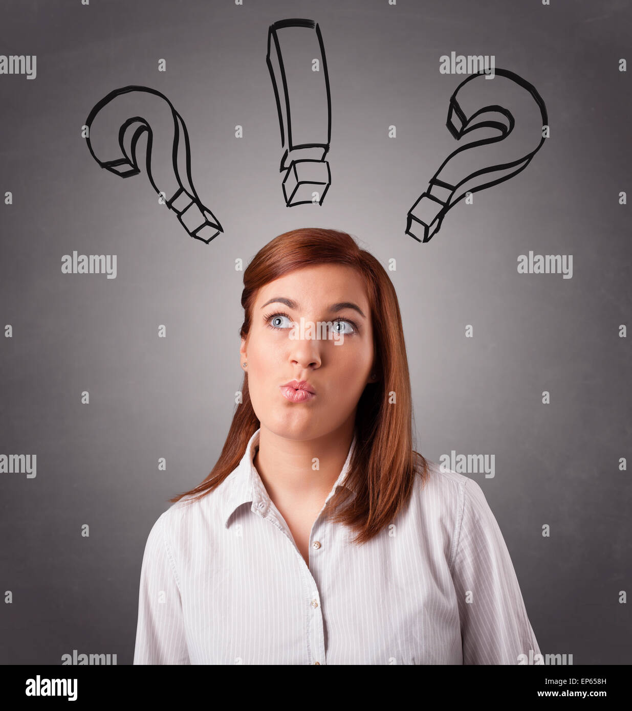 Young lady thinking with question marks overhead Stock Photo - Alamy