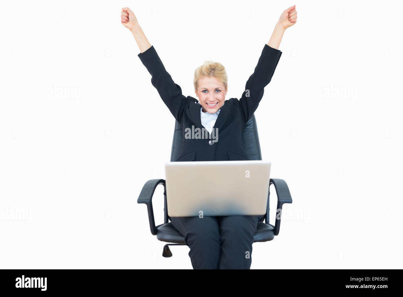 Successful business woman raising hands with laptop Stock Photo - Alamy