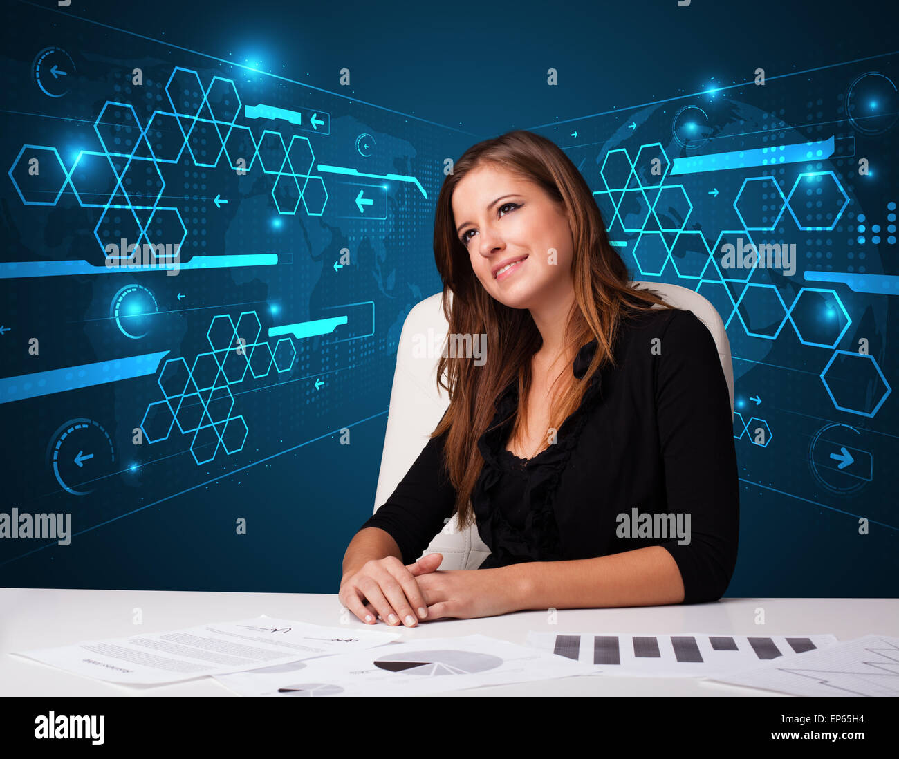 Businesswoman doing paperwork with futuristic background Stock Photo ...