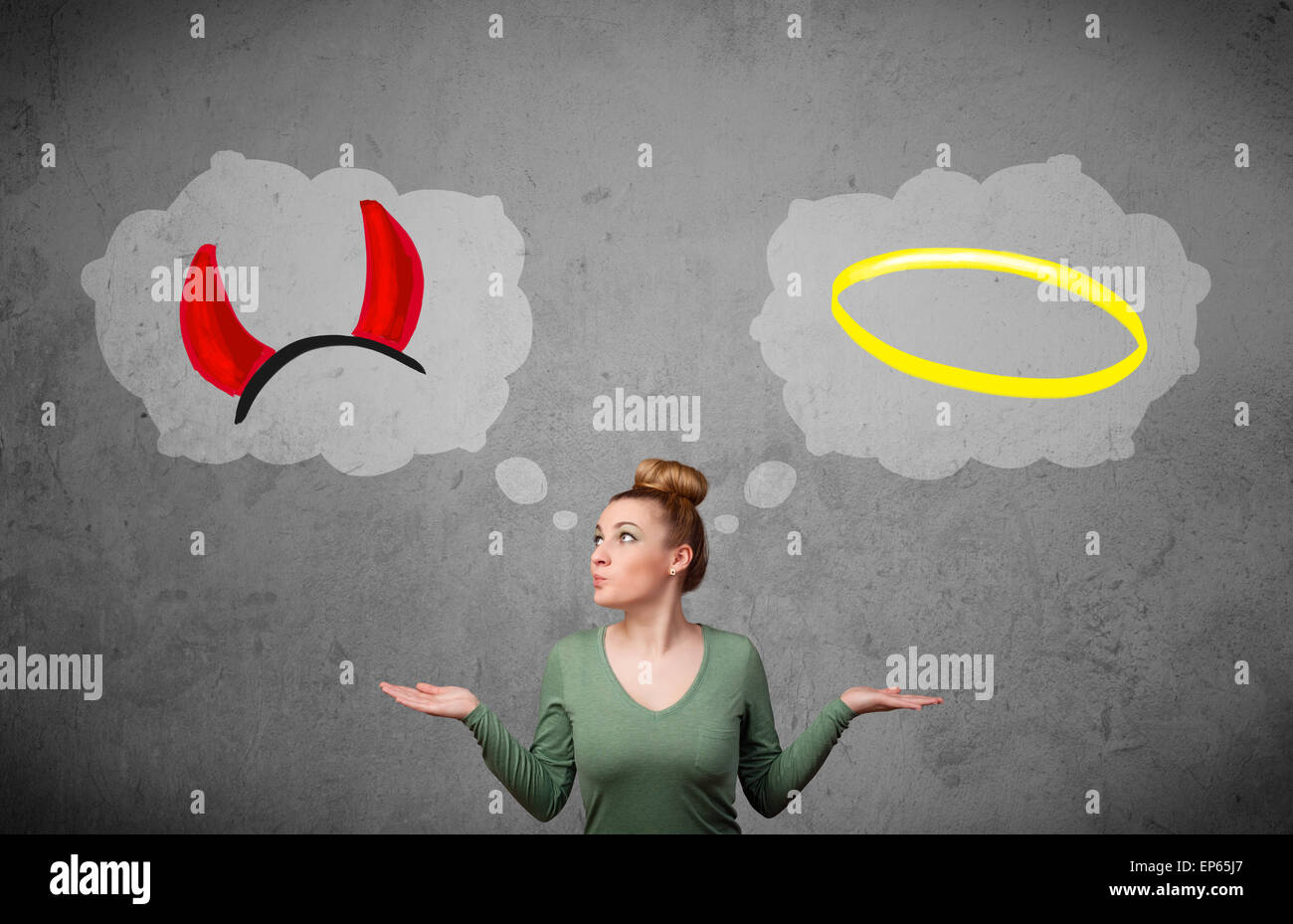 Woman choosing between good and bad Stock Photo - Alamy