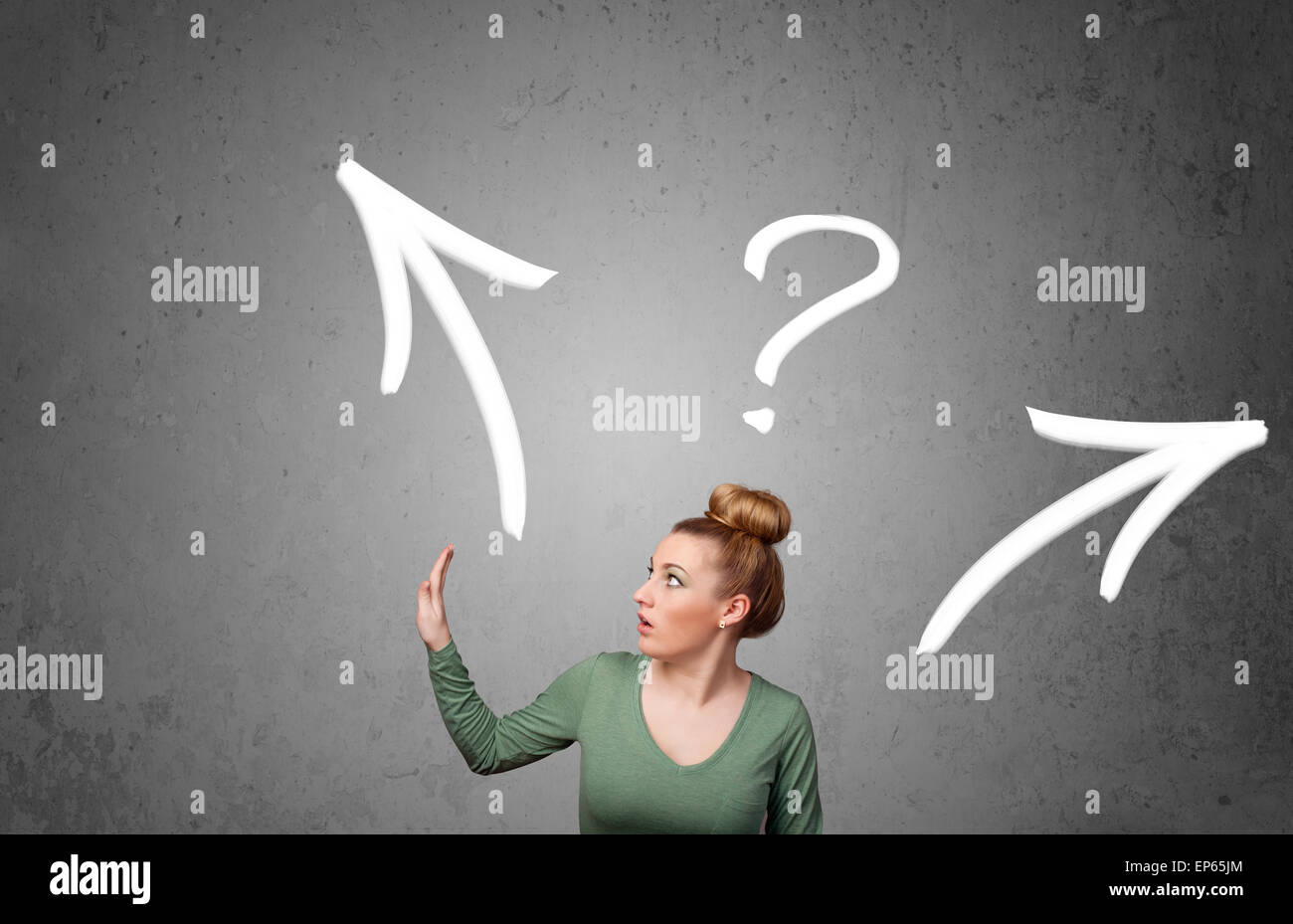 Young woman taking a decision Stock Photo - Alamy