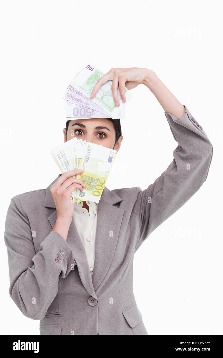 Young woman covering face money hi-res stock photography and images - Alamy