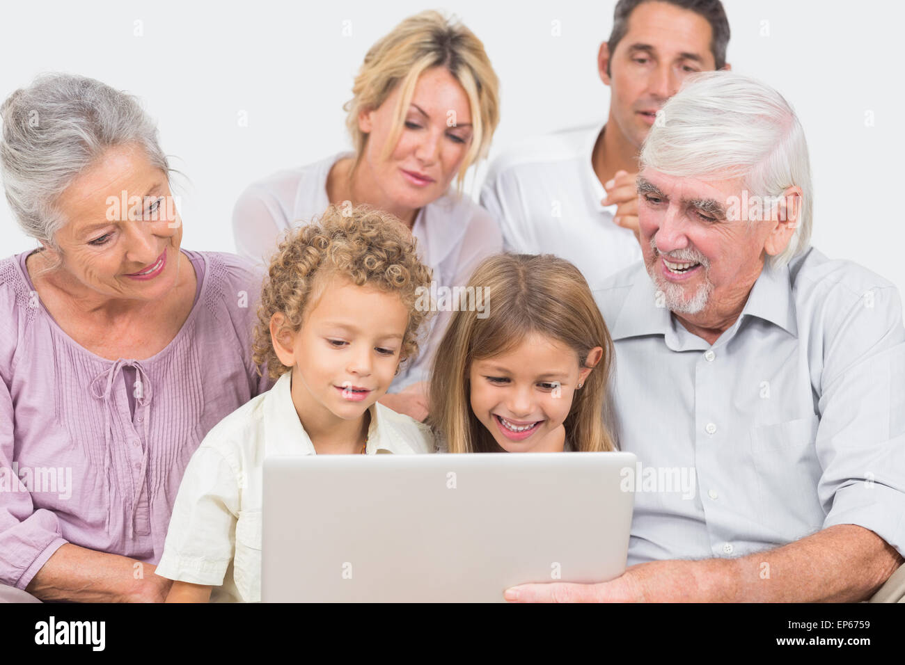 Grandfather grandson watching laptop hi-res stock photography and ...