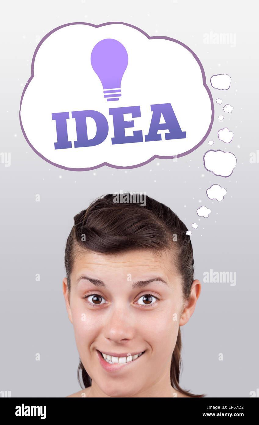 Young girl looking at idea type of sign Stock Photo - Alamy