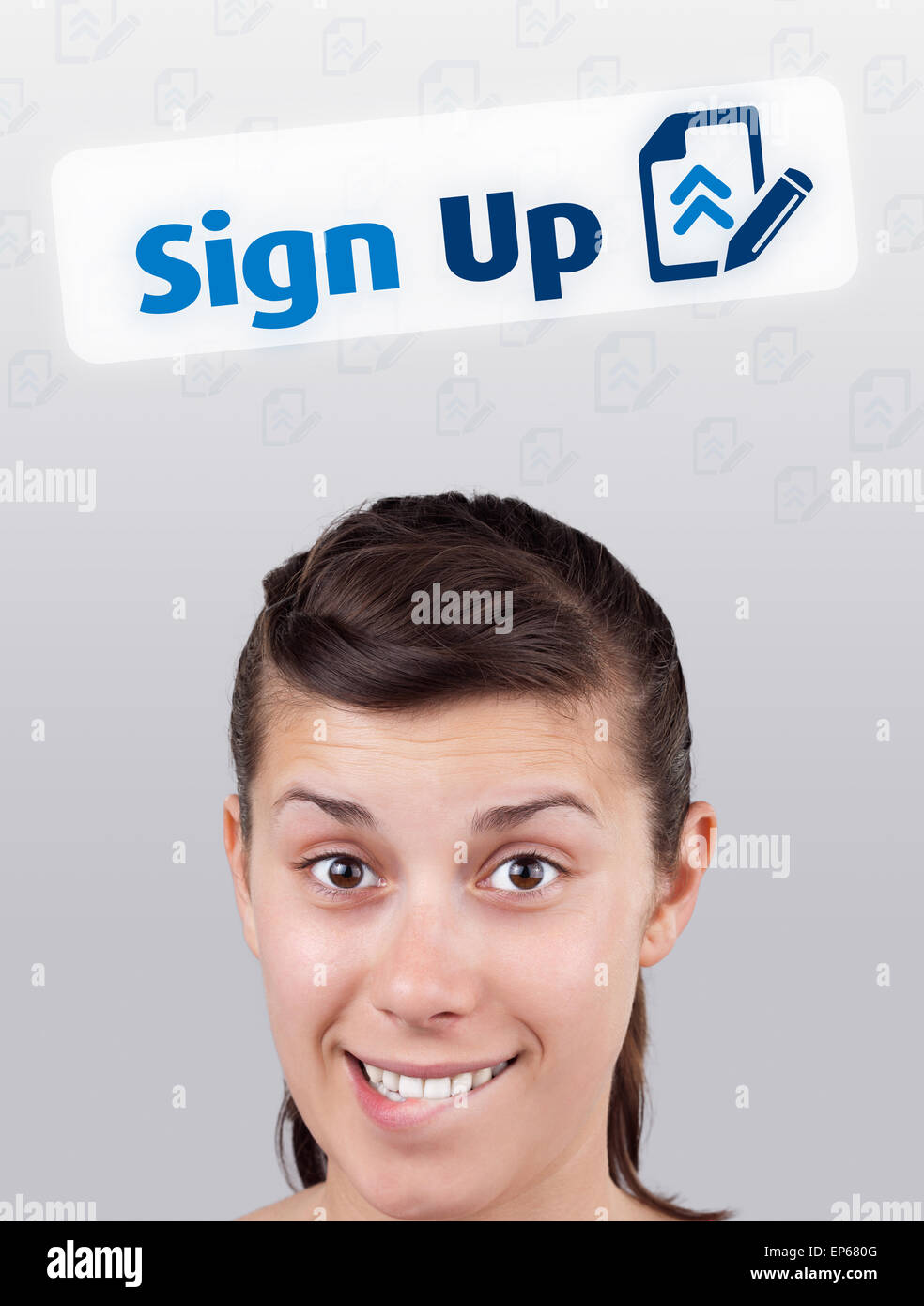 Young girl looking at internet type of icons Stock Photo - Alamy