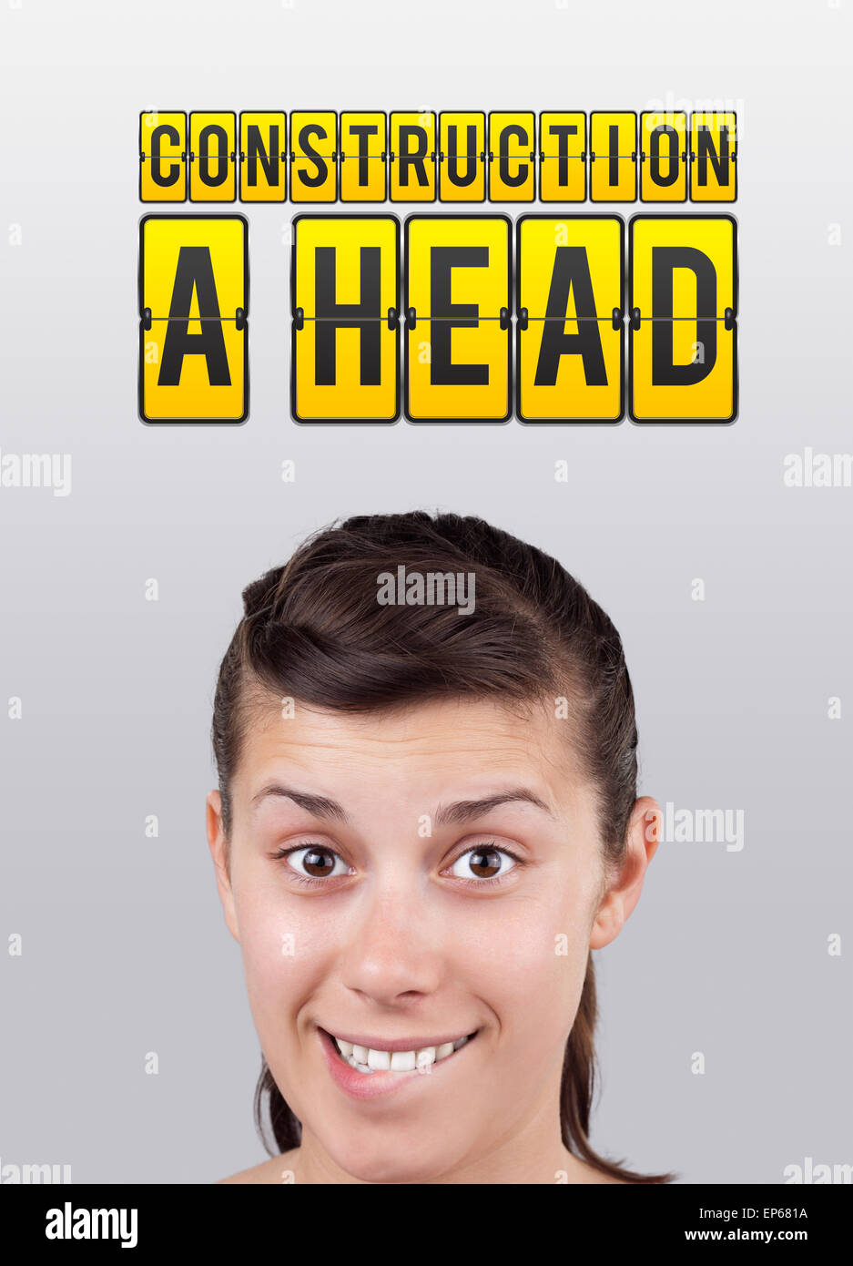 Young girl looking at idea type of sign Stock Photo - Alamy