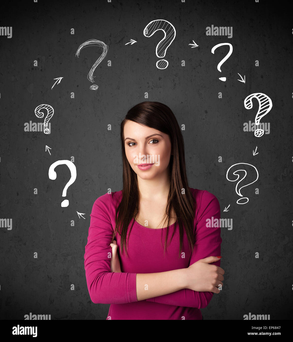 Young woman thinking with question mark circulation around her head ...