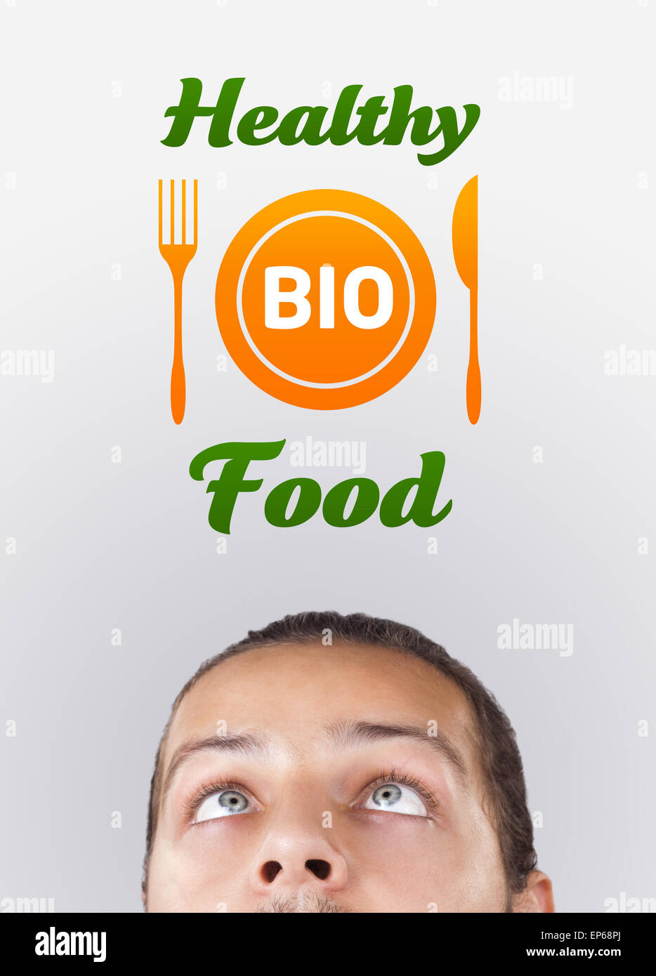 Young head looking at healthy food sign Stock Photo - Alamy
