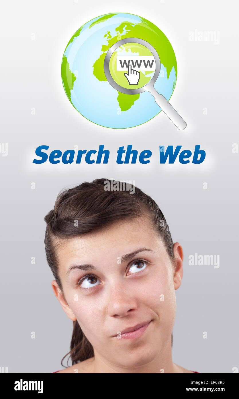 Young girl looking at internet type of icons Stock Photo - Alamy