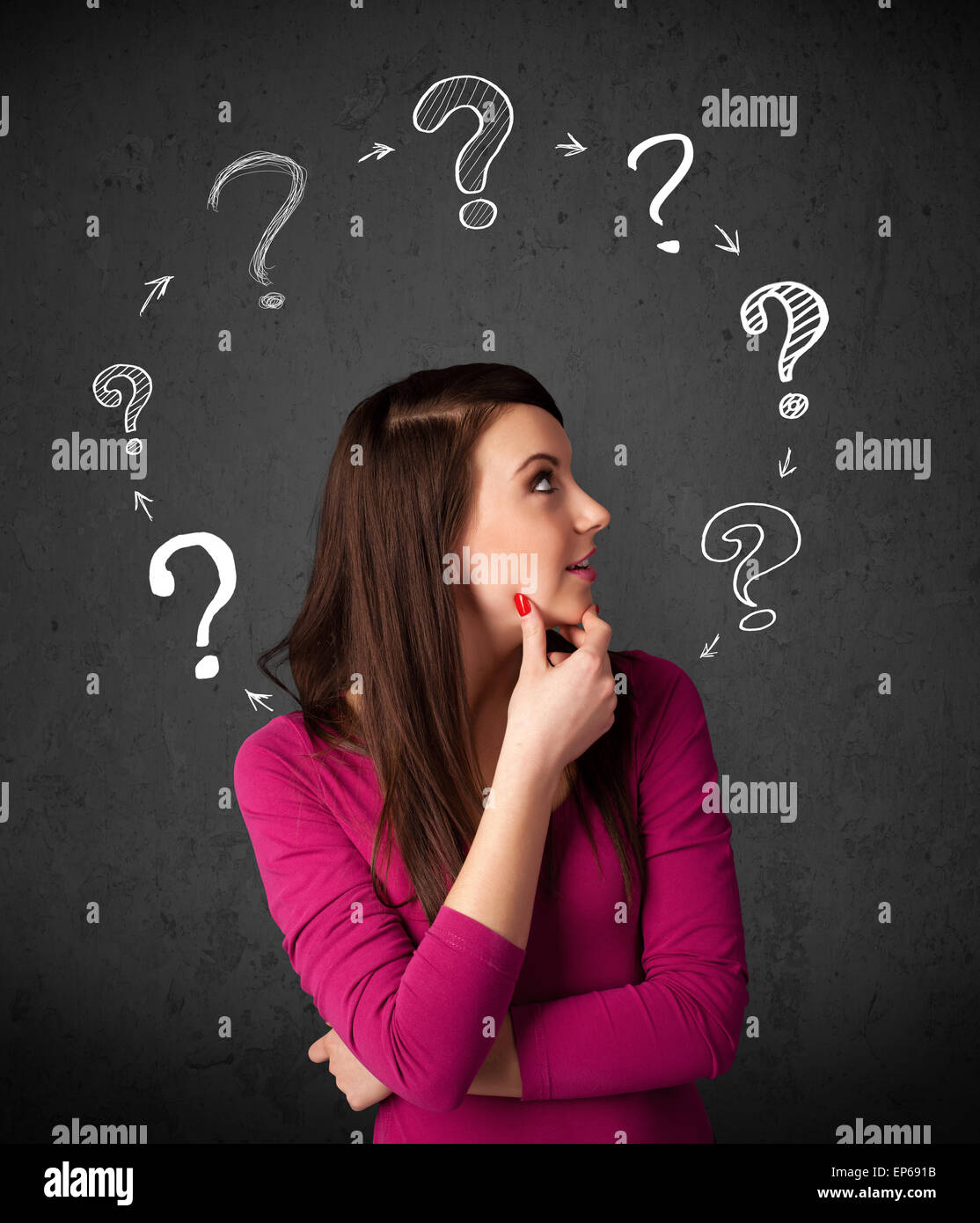 Young woman thinking with question mark circulation around her head ...