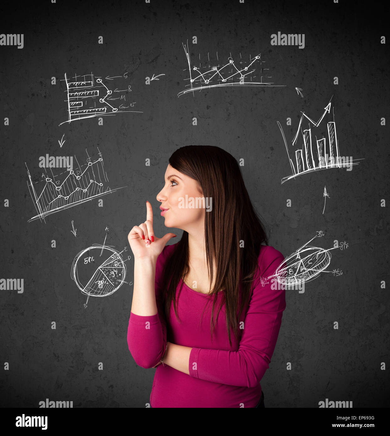 Young woman thinking with charts circulation around her head Stock ...