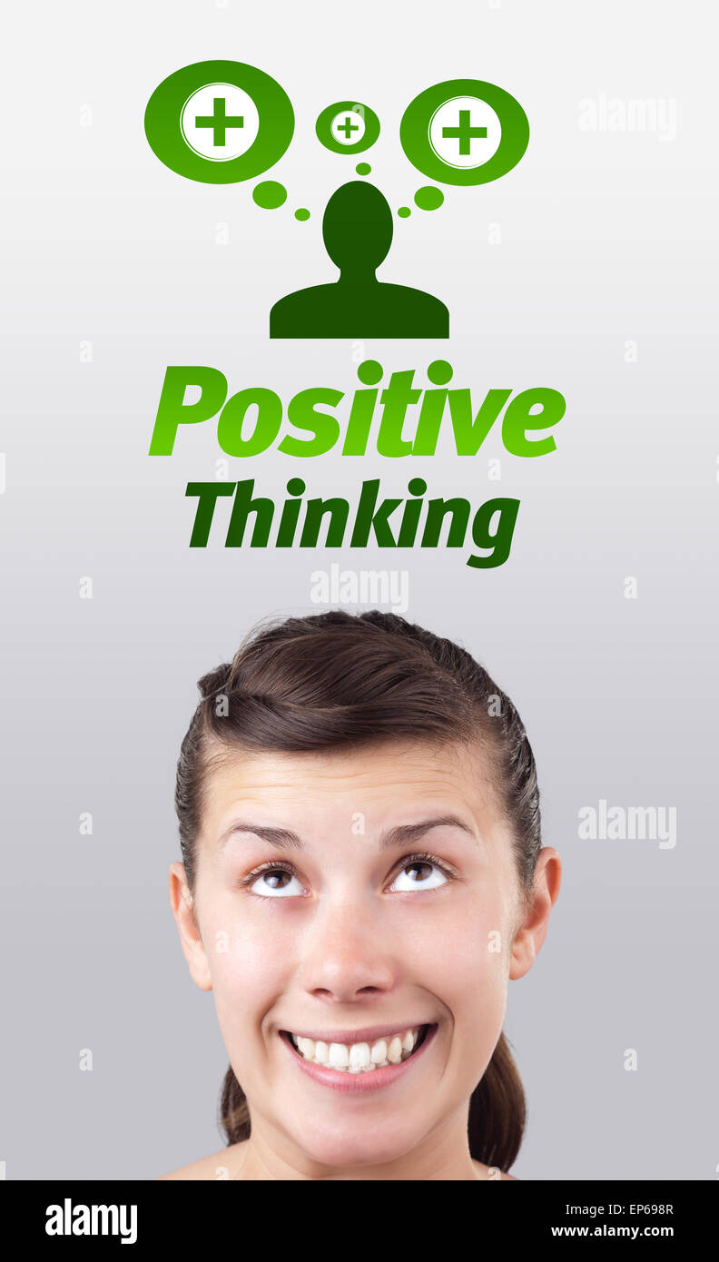Young girl looking at positive negative signs Stock Photo - Alamy