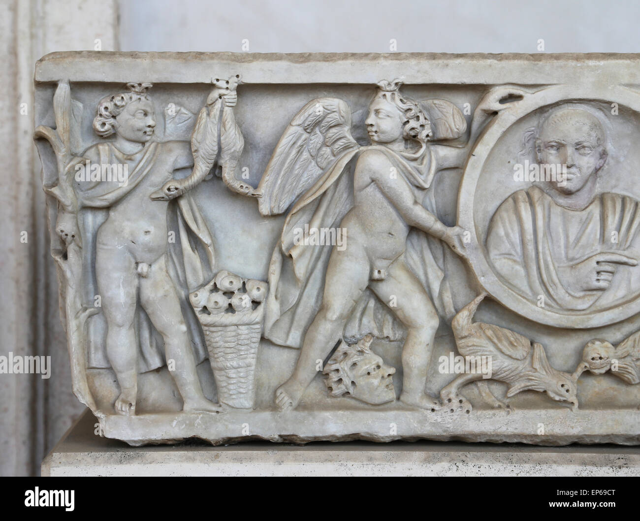 Sarcophagus with man's bus in a clipeus. Cupid holding ducks. Marble ...