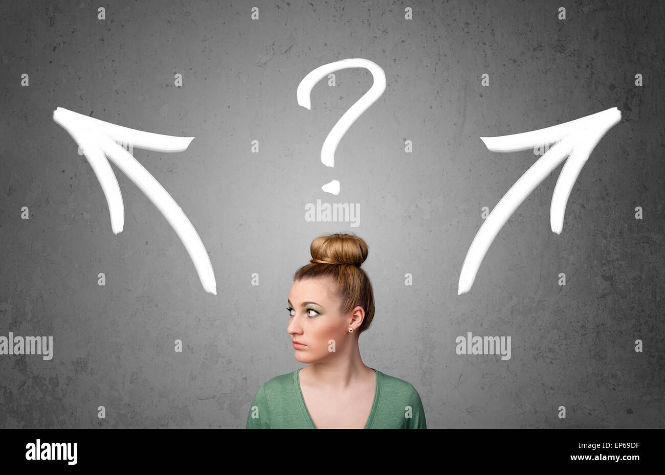 Young woman taking a decision Stock Photo - Alamy