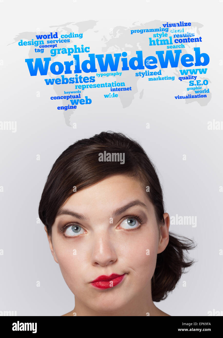 Young girl looking at internet type of icons Stock Photo - Alamy