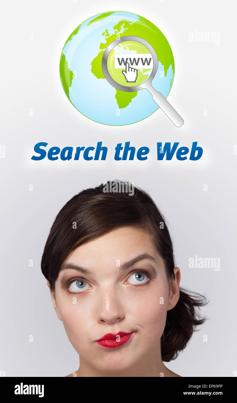 Young girl looking at internet type of icons Stock Photo - Alamy