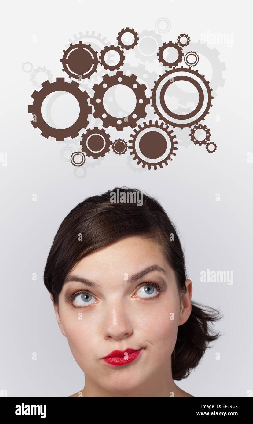 Young girl looking at idea type of sign Stock Photo - Alamy