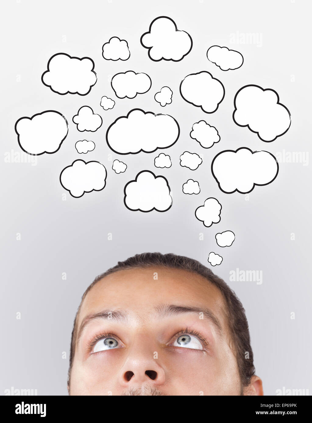 Young head thinking with clouds Stock Photo - Alamy