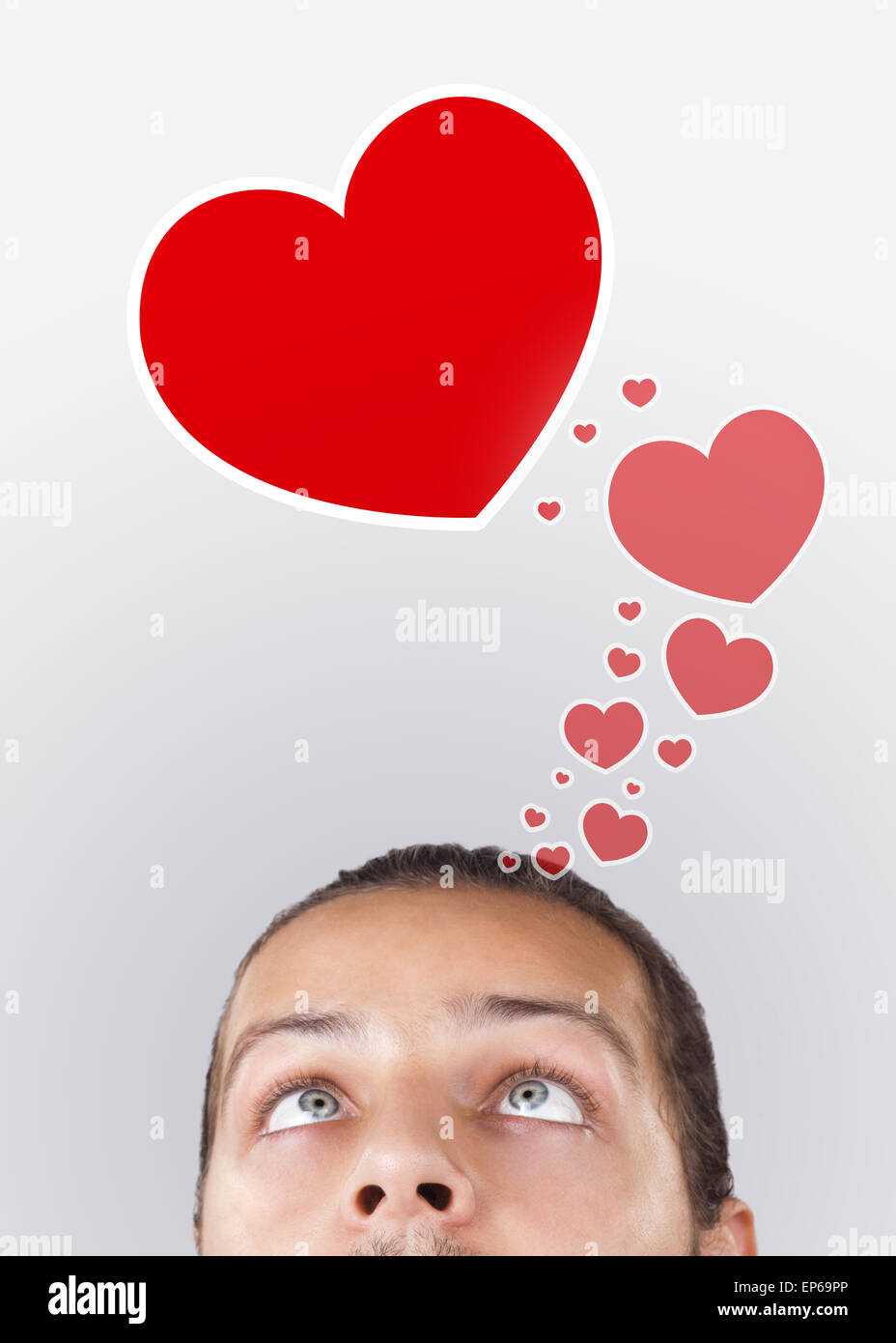 Young head looking at love type of icons Stock Photo - Alamy
