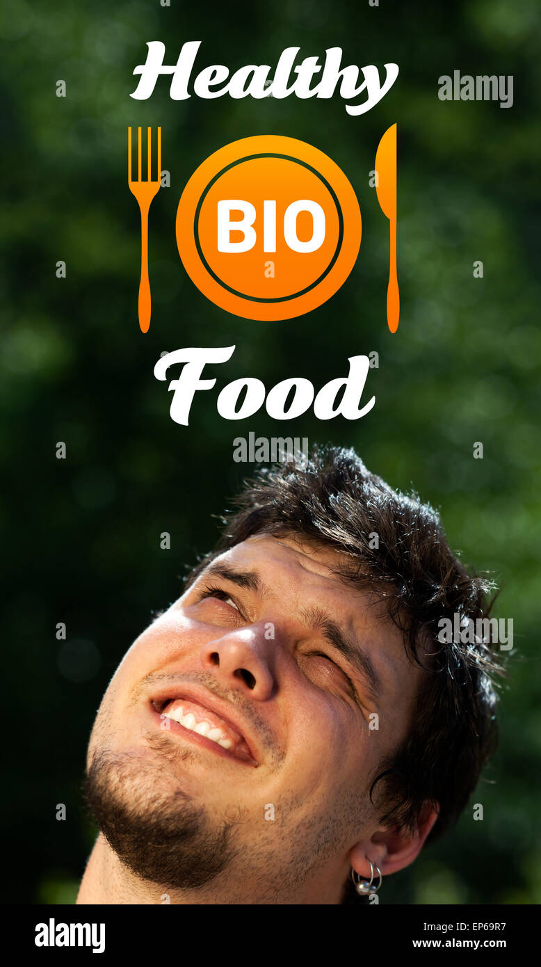 Young head looking at healthy food sign Stock Photo - Alamy