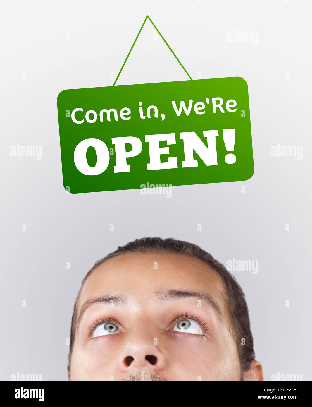 Young persons head looking at closed and open signs Stock Photo - Alamy