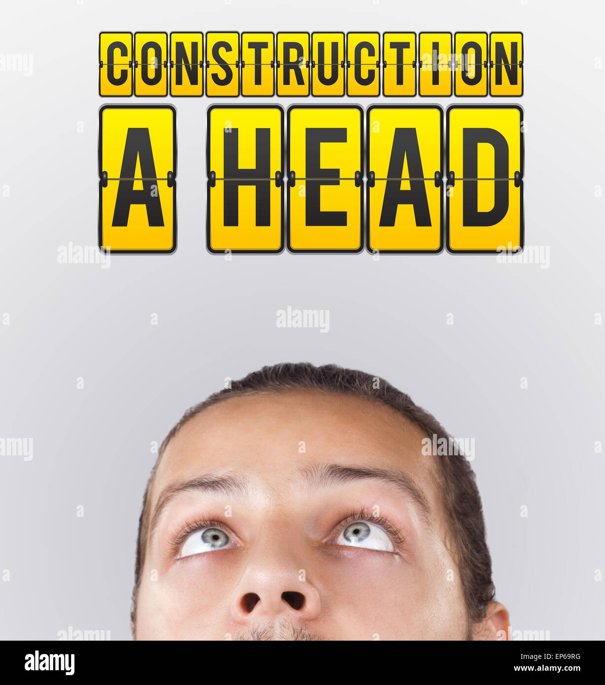 Young person looking at idea type of sign Stock Photo - Alamy