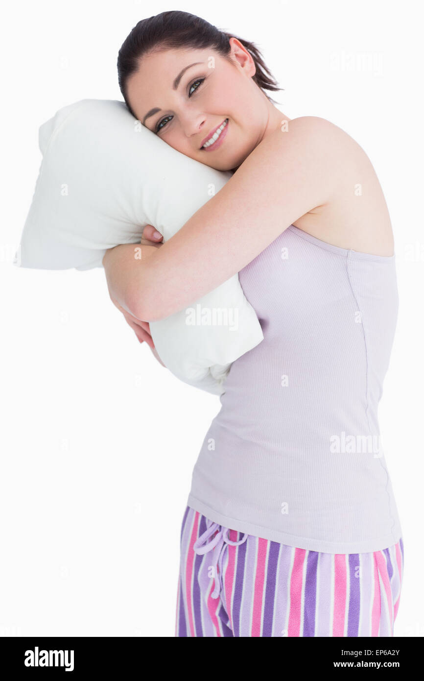 Pretty standing woman relaxing on her comfortable pillow Stock Photo ...