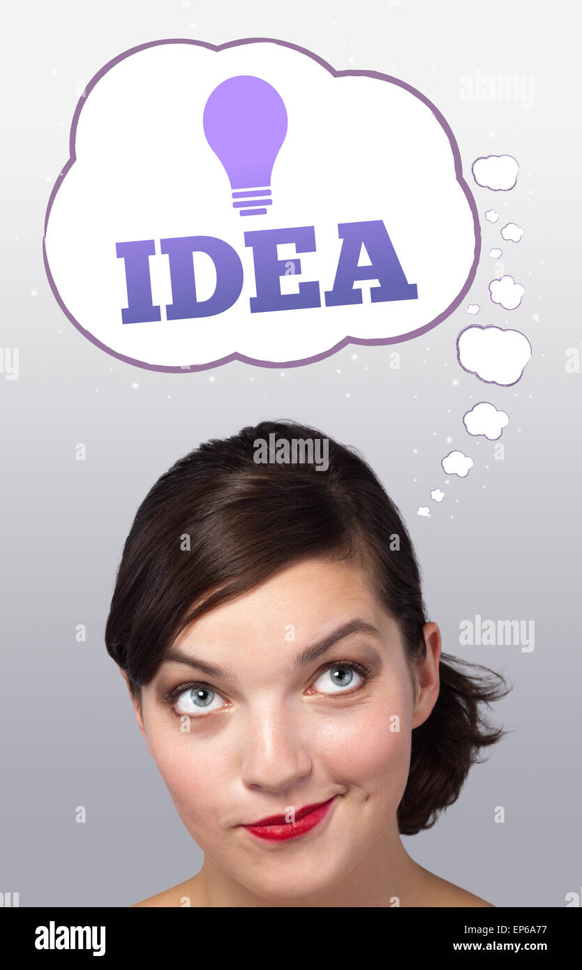 Young girl looking at idea type of sign Stock Photo - Alamy