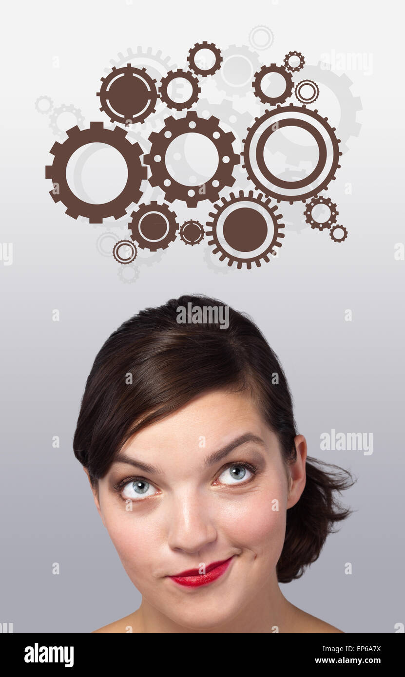 Young girl looking at idea type of sign Stock Photo - Alamy