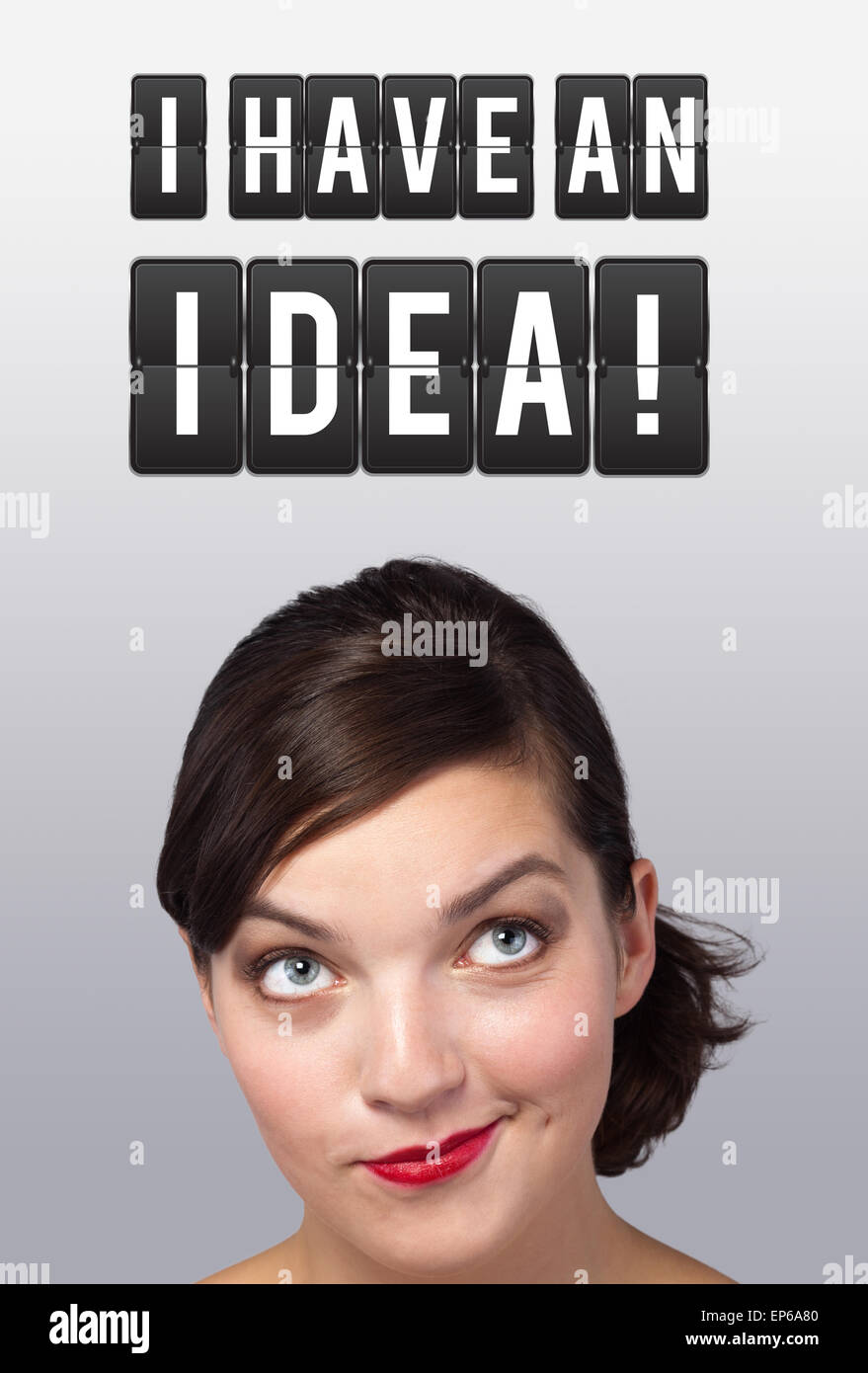 Young girl looking at idea type of sign Stock Photo - Alamy