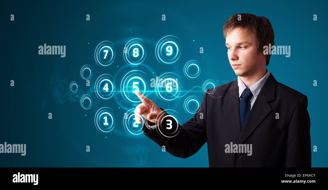 Businessman pressing high tech type of modern buttons Stock Photo - Alamy