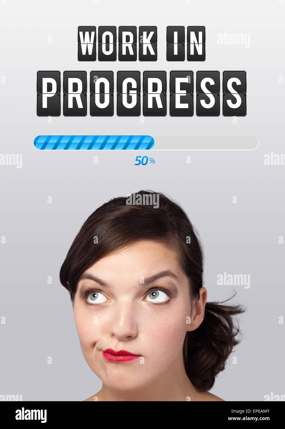 Young girl looking at idea type of sign Stock Photo - Alamy