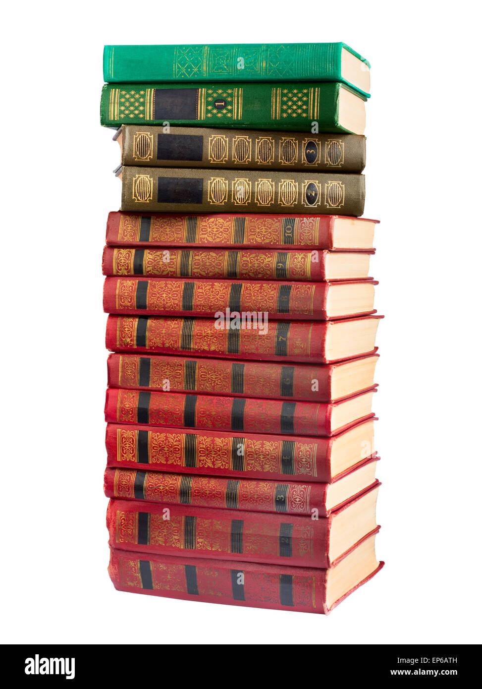 A stack of old books with gold stamping on a white background isolated ...