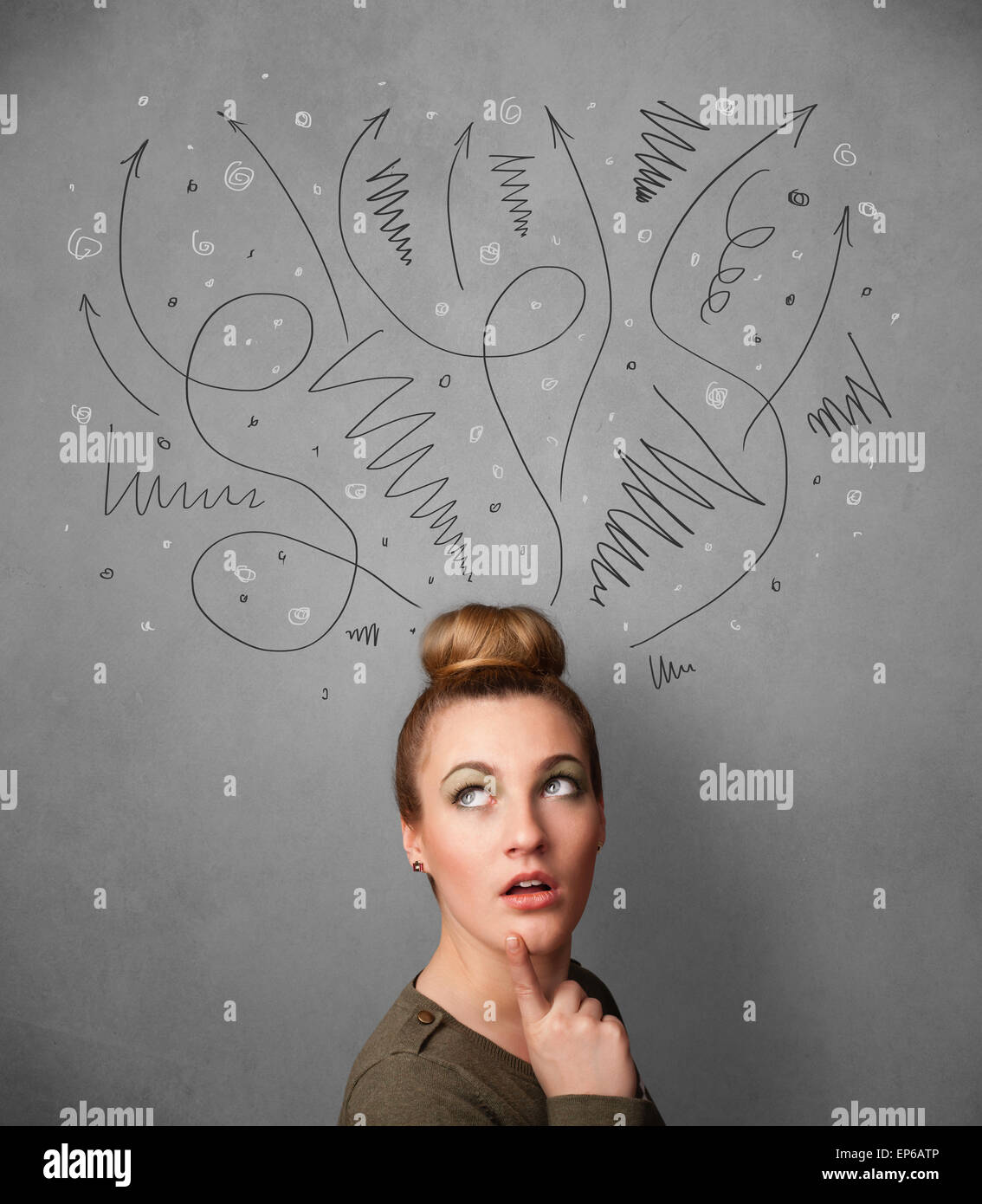 Young woman thinking with arrows over her head Stock Photo - Alamy