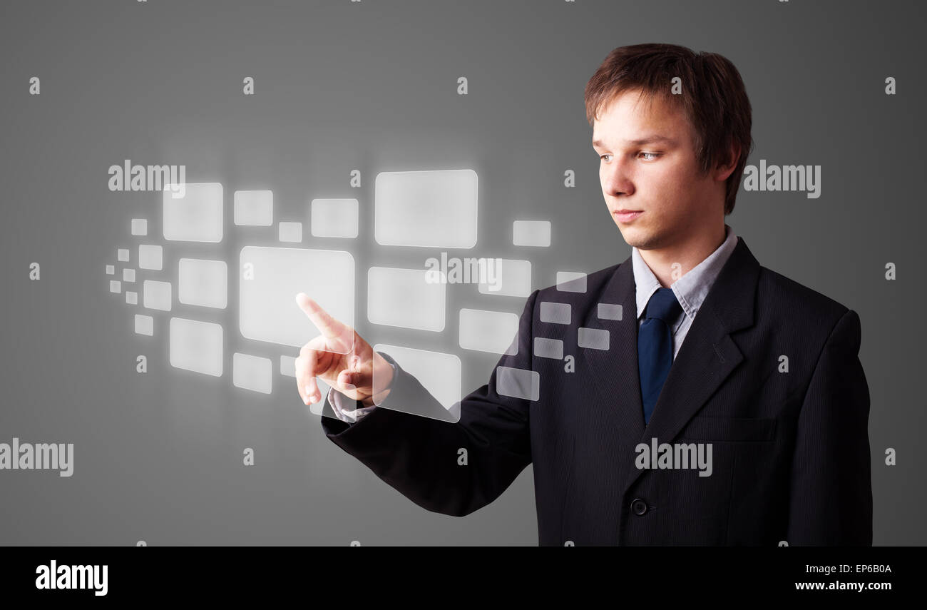 Businessman pressing high tech type of modern buttons Stock Photo - Alamy