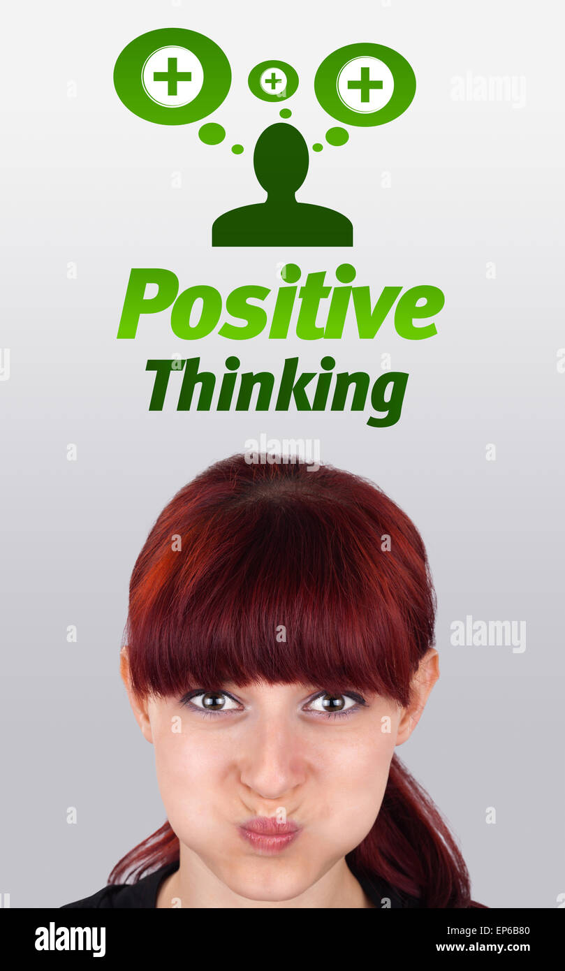 Young girl looking at positive negative signs Stock Photo - Alamy