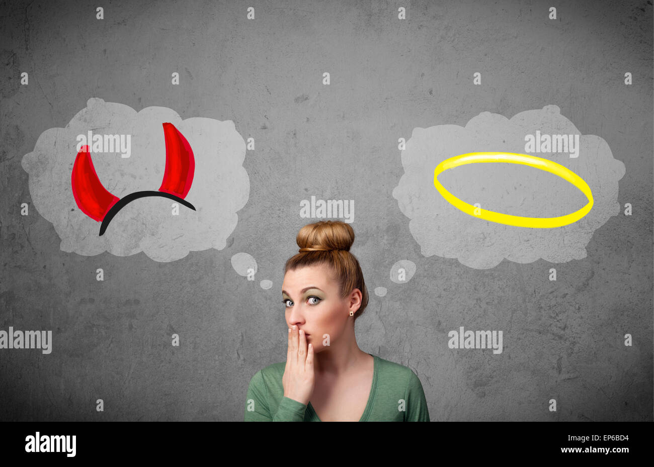 Woman choosing between good and bad Stock Photo - Alamy