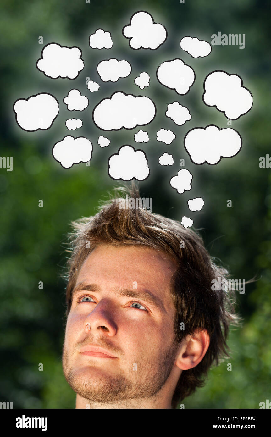 Young head thinking with clouds Stock Photo - Alamy