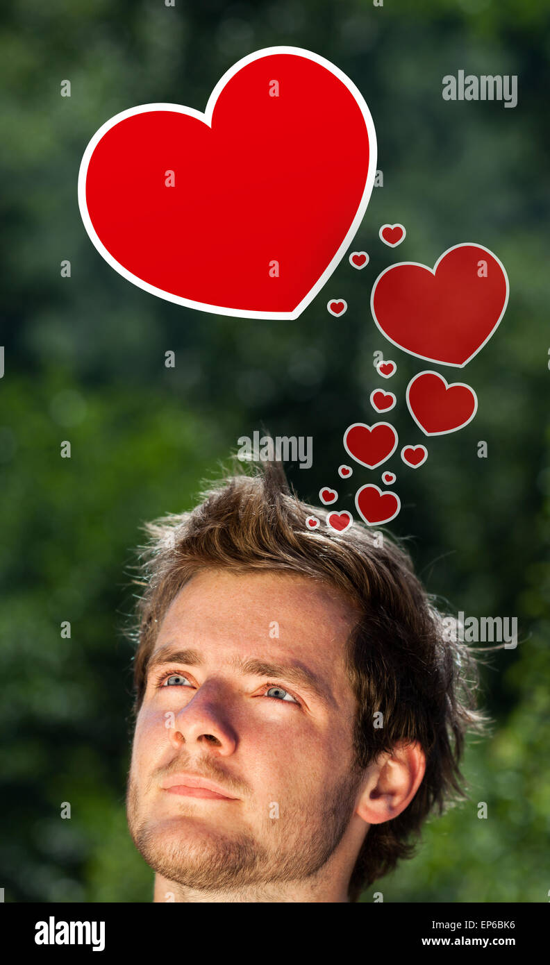 Young head looking at love type of icons Stock Photo - Alamy