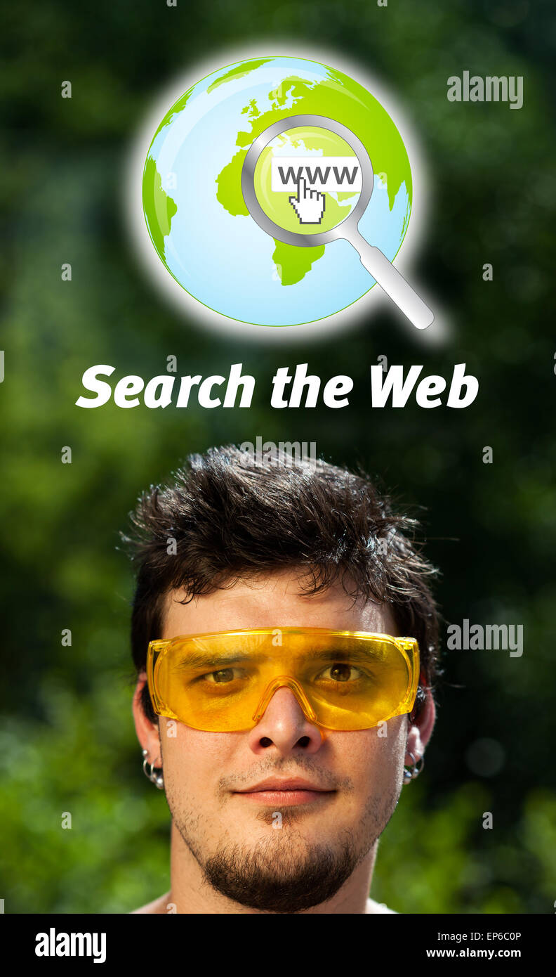 Young head looking at internet type of icons Stock Photo - Alamy