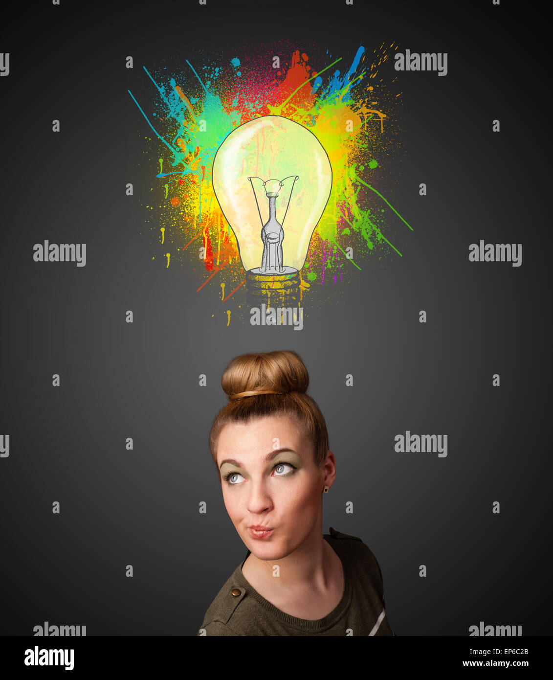 Young woman thinking with lightbulb above her head Stock Photo - Alamy